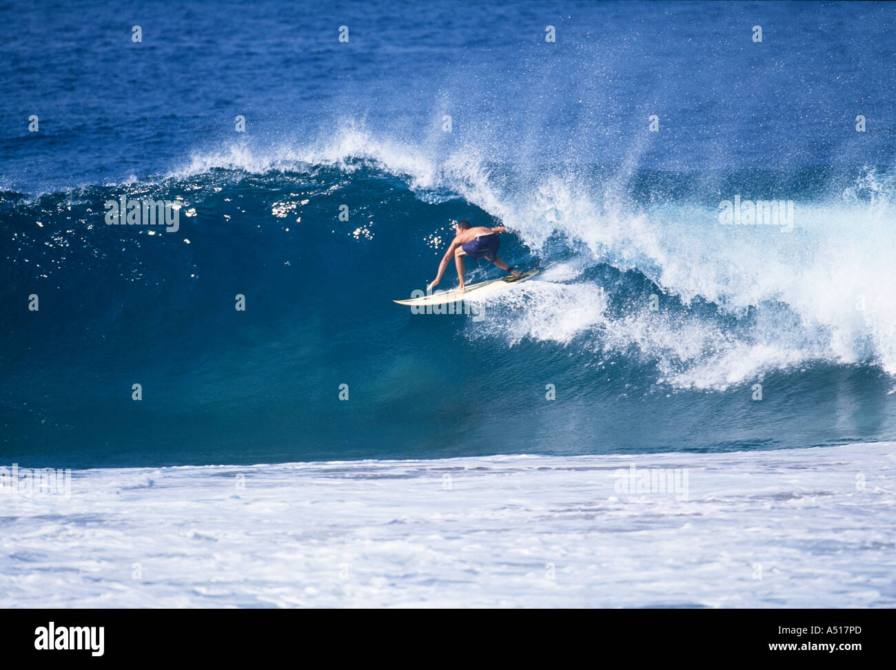 Surfer riding inside wave hi-res stock photography and images - Alamy