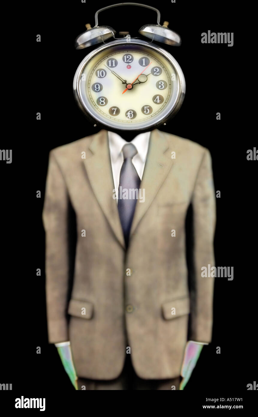 businessman with an alarm clock for a head concept Stock Photo - Alamy