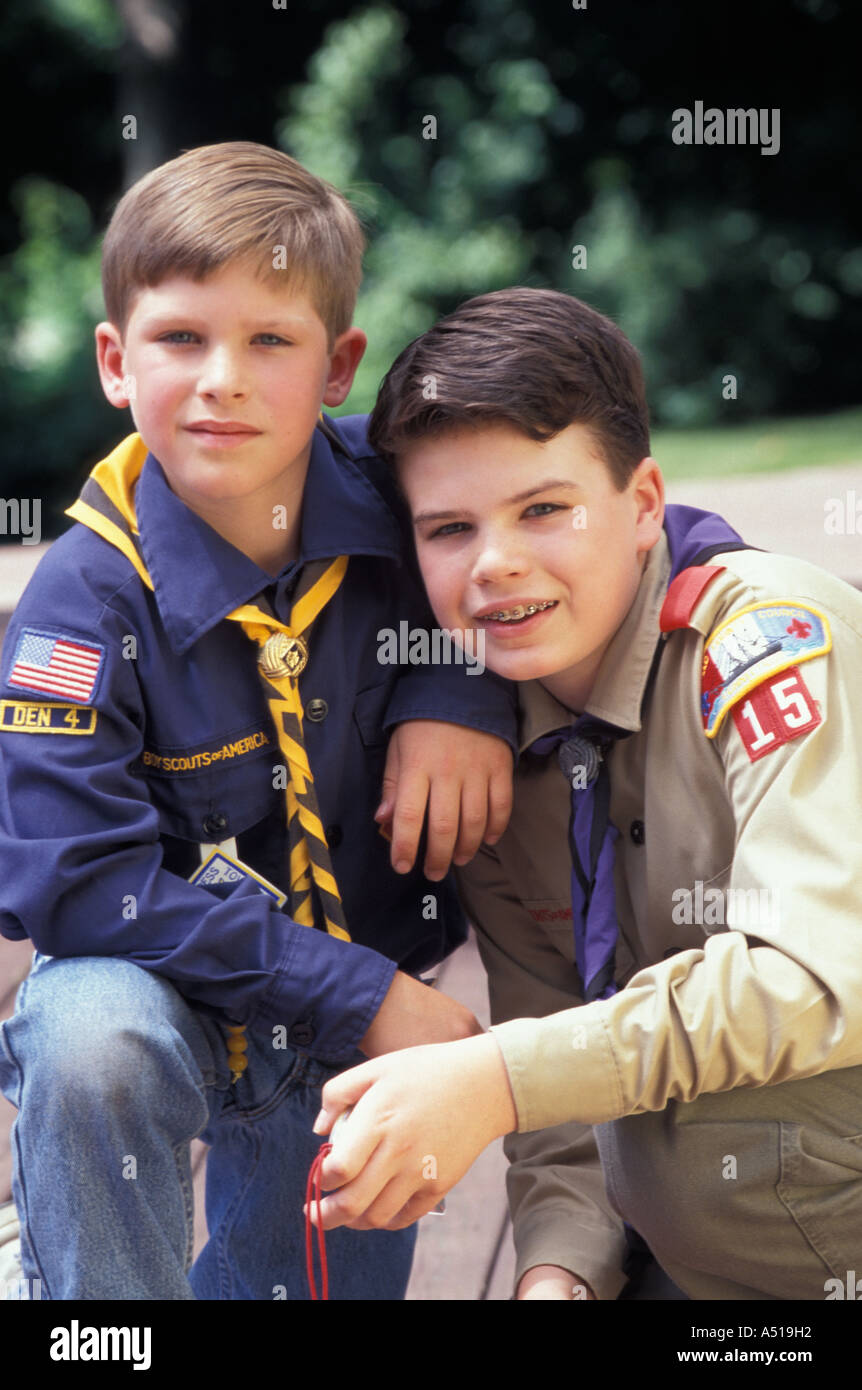 Boy Scout and Cub Scout posing for portrait User needs to obtain ...