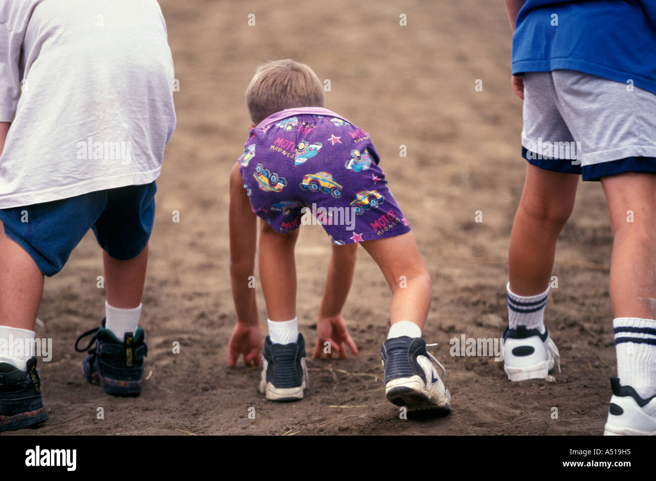 Child win a race hi-res stock photography and images - Alamy