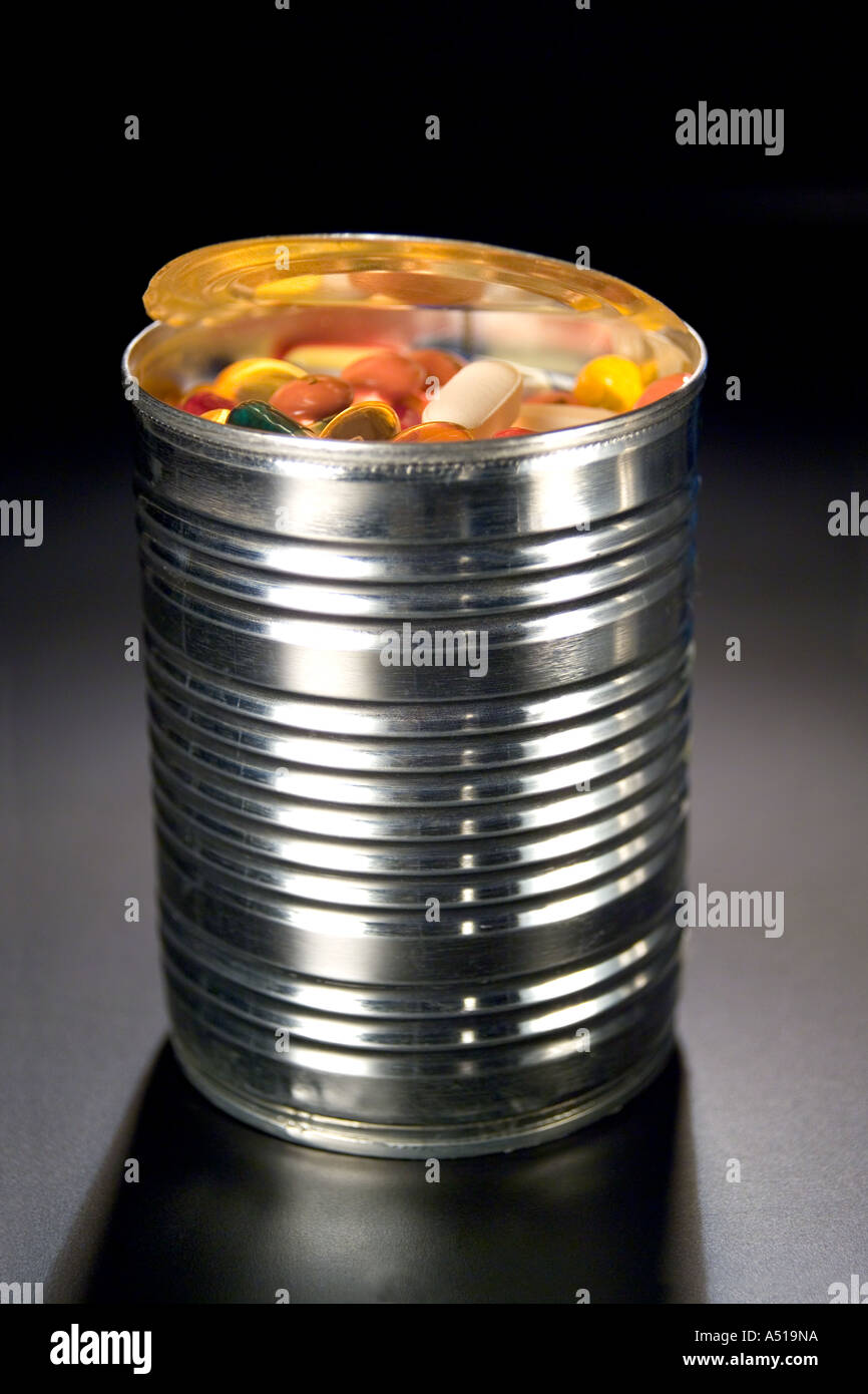 Tin Can of Pills vertical Stock Photo - Alamy