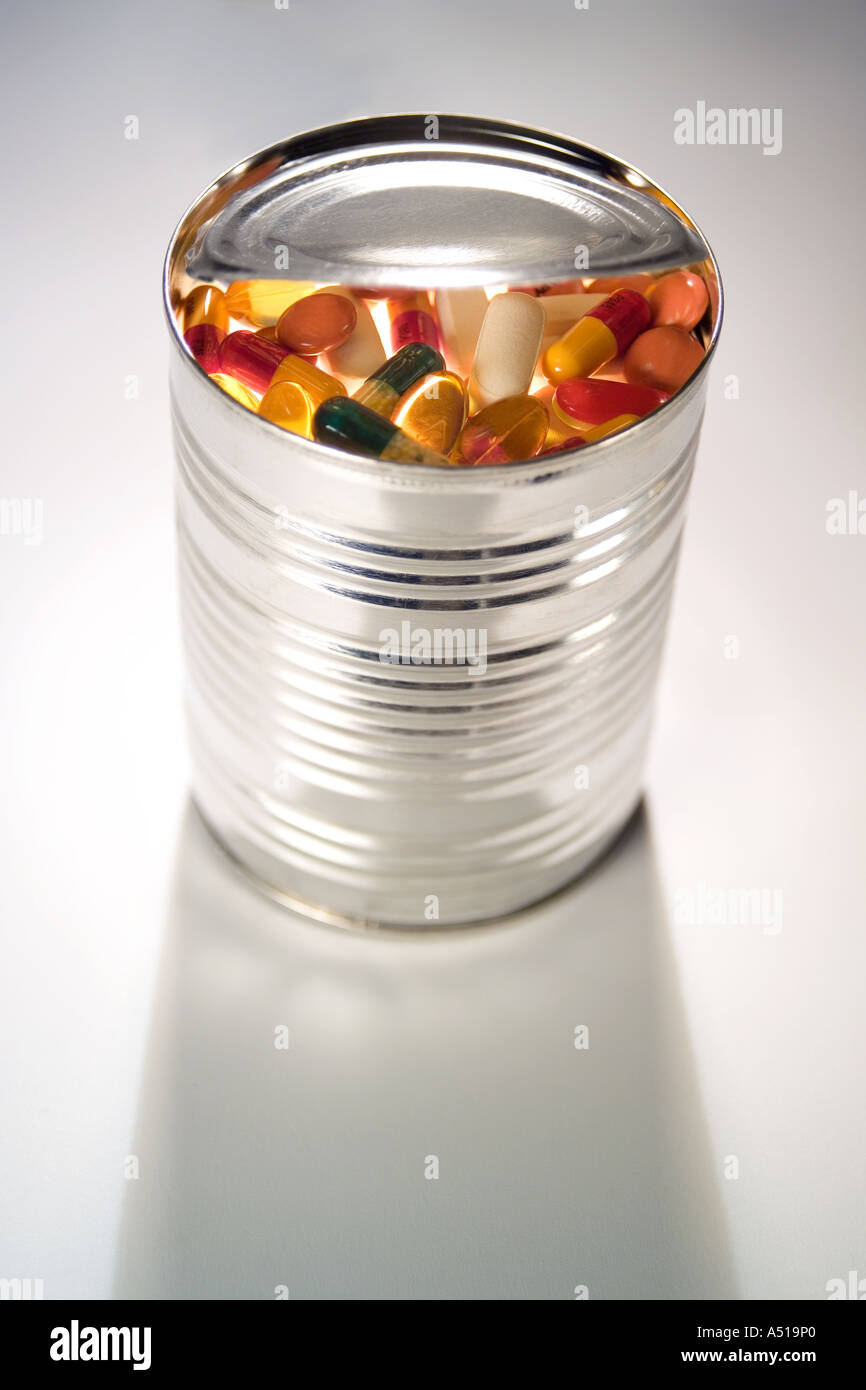 Tin Can of Pills vertical Stock Photo - Alamy