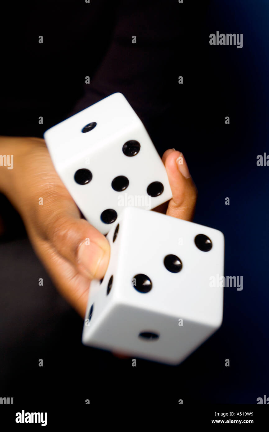 Big dice in hand african hi-res stock photography and images - Alamy