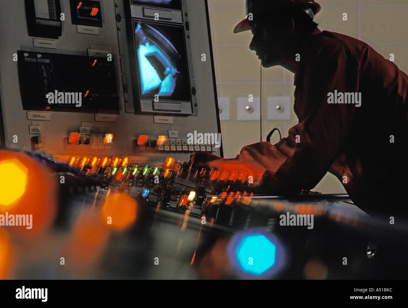 Manufacturing control room silhouette of engineer Stock Photo - Alamy