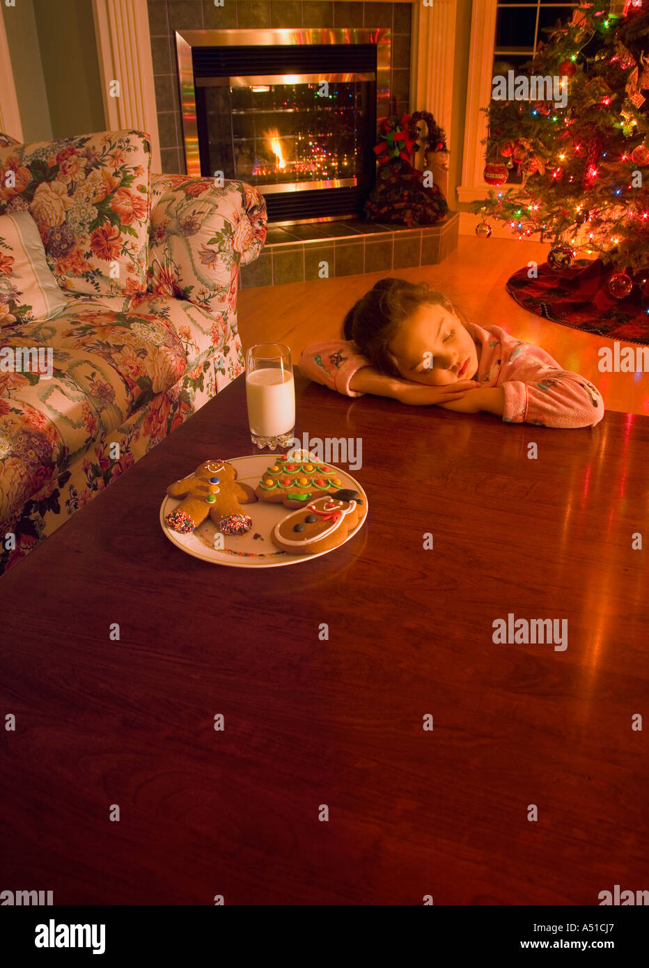 Santa asleep fireplace hi-res stock photography and images - Alamy