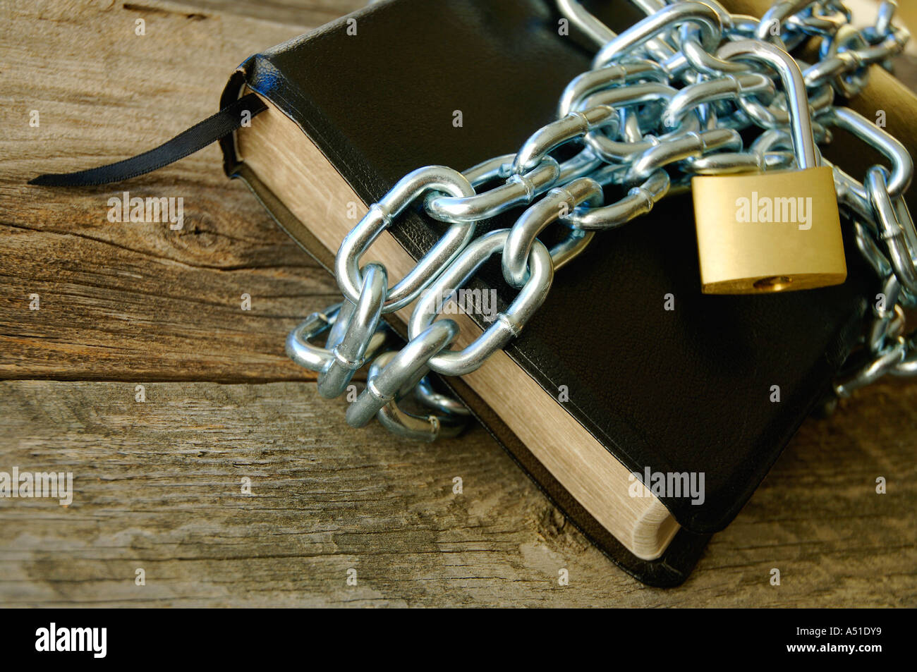 Book with chains Stock Photo - Alamy