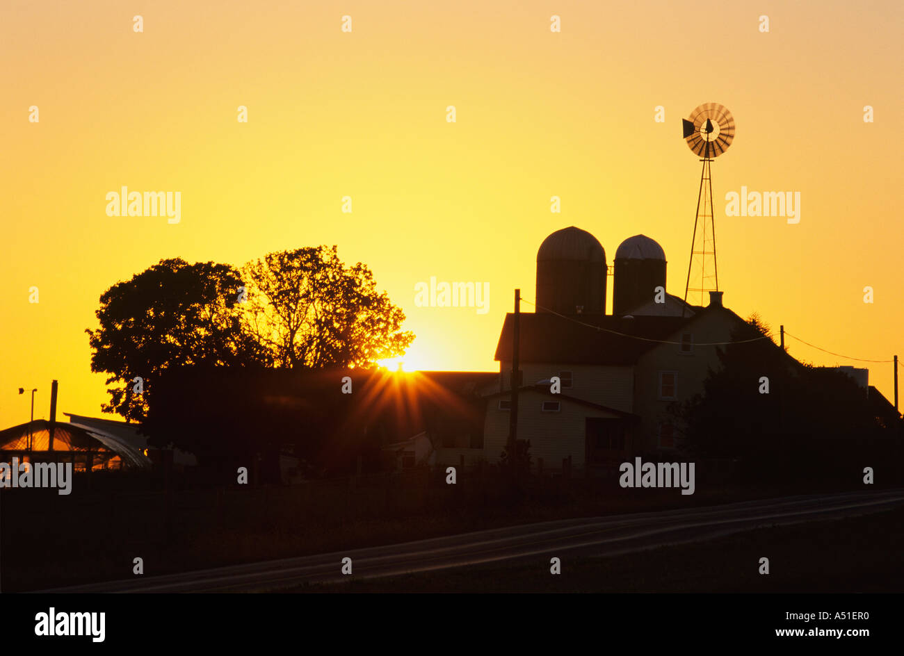 Amish farm at sunrise Stock Photo - Alamy