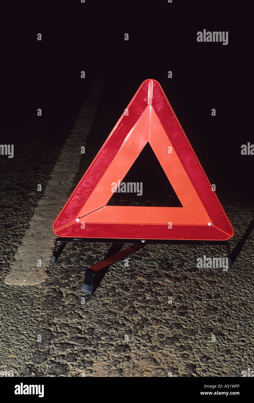 hazard warning triangle on country road warning of danger ahead ...