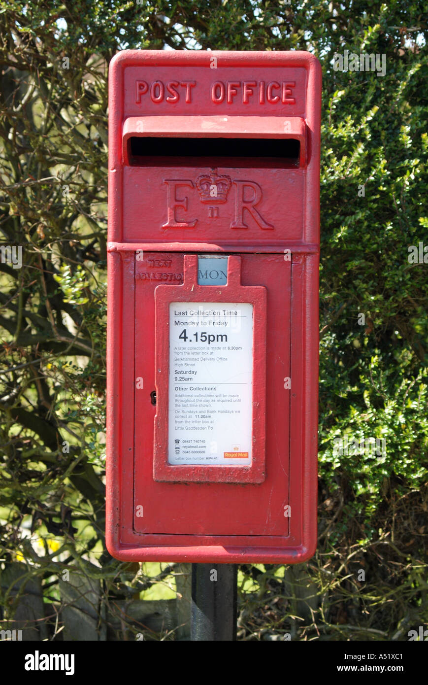 ER Red letter, post, mail, box attached to gate in the English ...