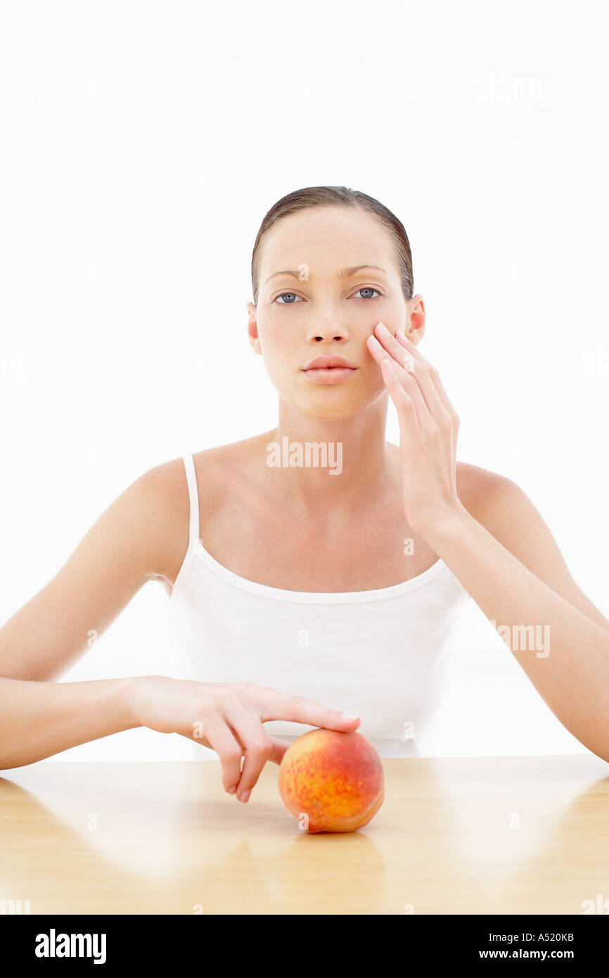 Woman wearing peach top hi-res stock photography and images - Alamy