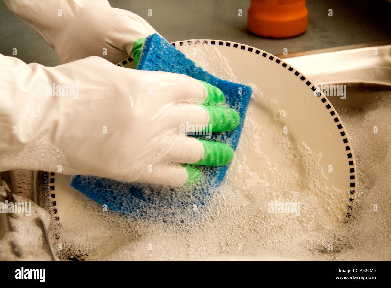 Washing plates sponge rubber hi-res stock photography and images - Alamy