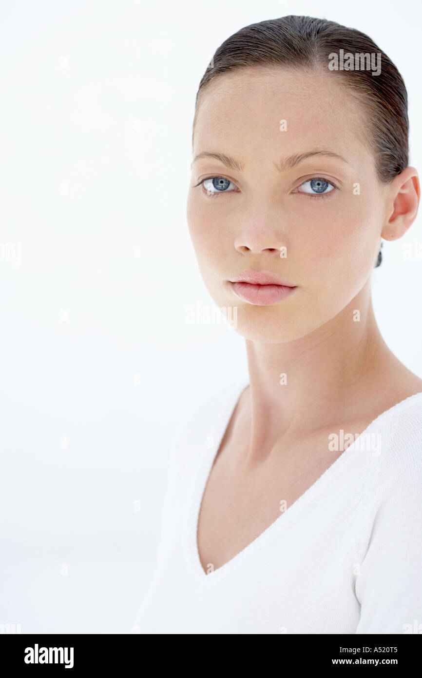 Woman looking at camera brunette serious hi-res stock photography and ...