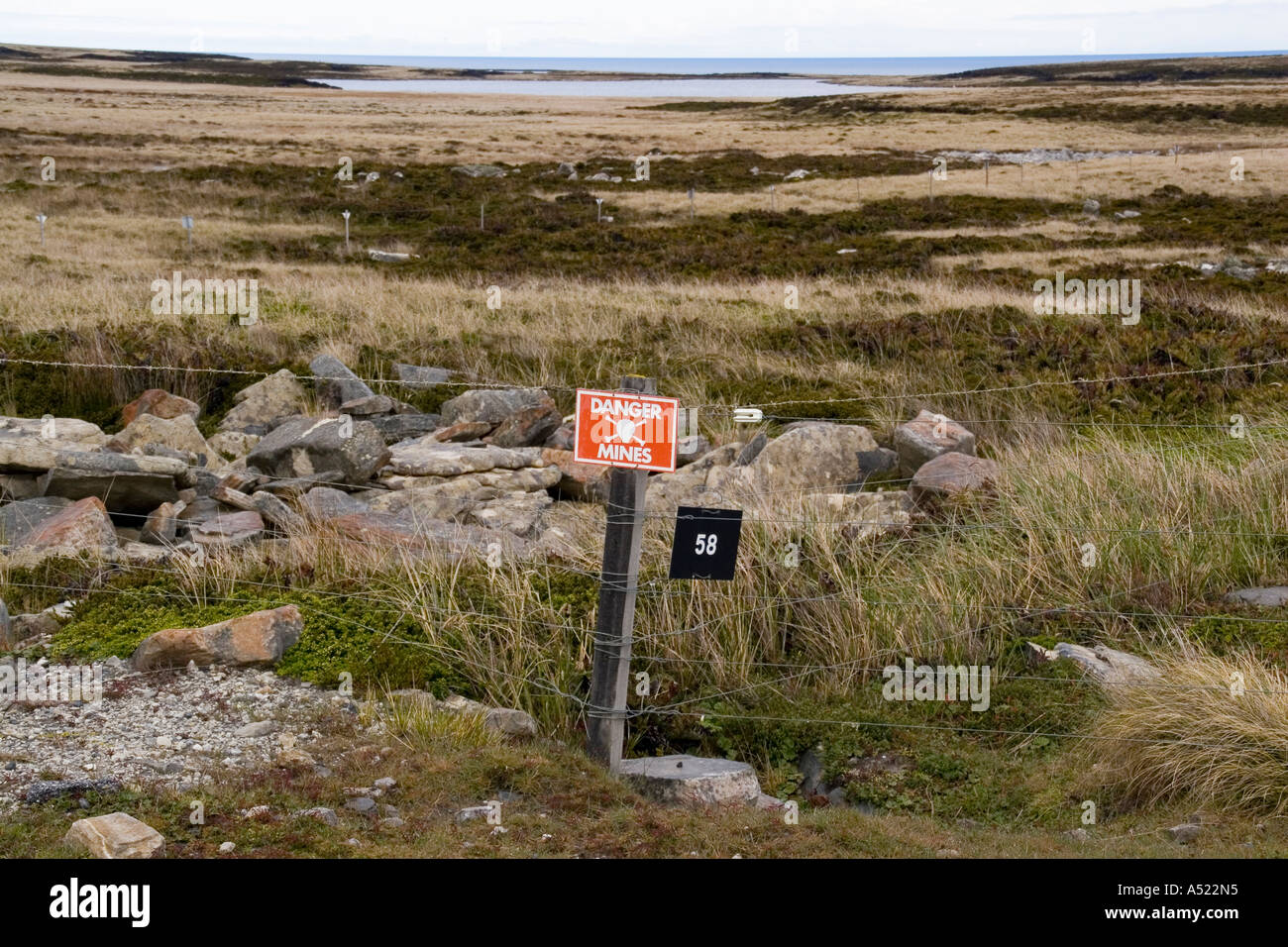 mine field sign in the falklands Stock Photo - Alamy