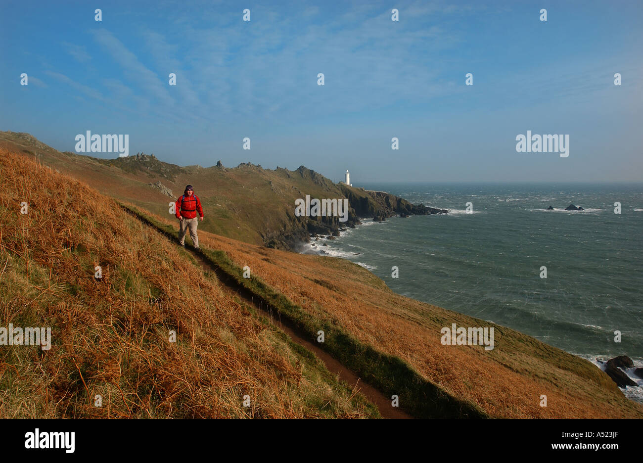 man hiking south west coast path near start point devon Stock Photo - Alamy