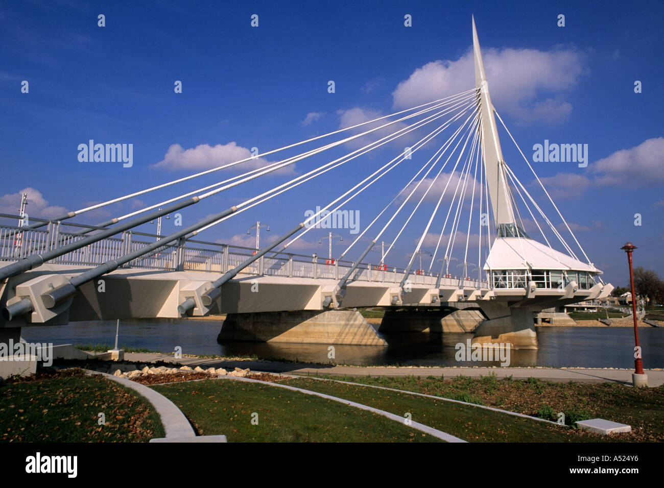 Modern downtown white Provencher Bridge of Winnipeg Manitoba Canada ...