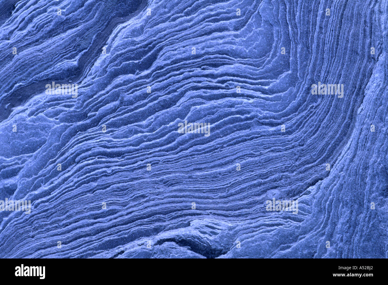 Wave worn rock Stock Photo - Alamy