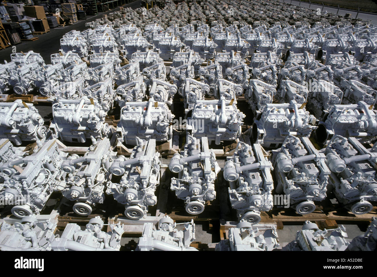 rows of new diesel engines ready to be installed in 18 wheeler truck ...