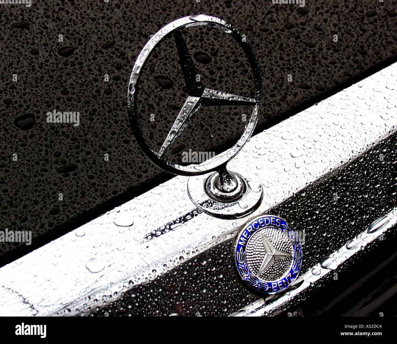 Mercedes star Badge with droplets Stock Photo - Alamy
