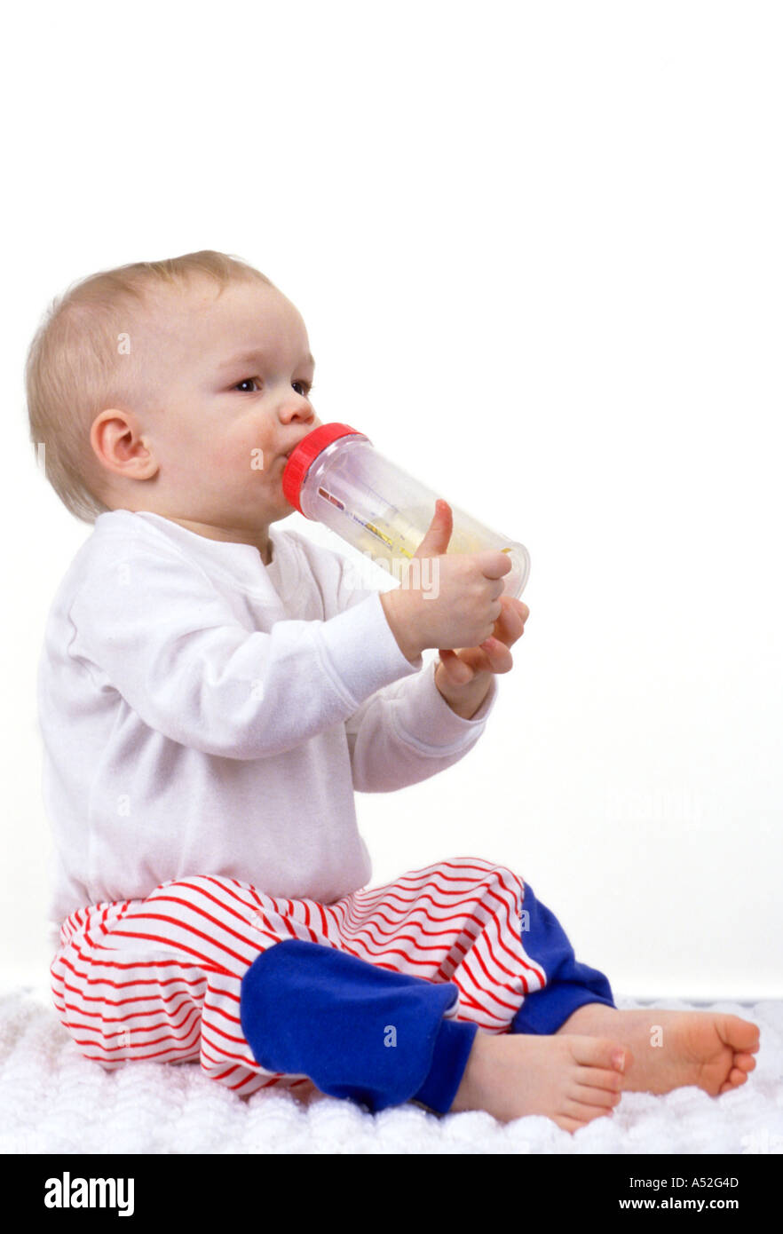 baby with bottle babies boy children kids young youth drinking MR Stock ...