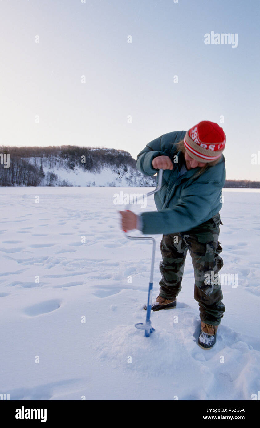 Drilling hole in ice with auger hi-res stock photography and images - Alamy