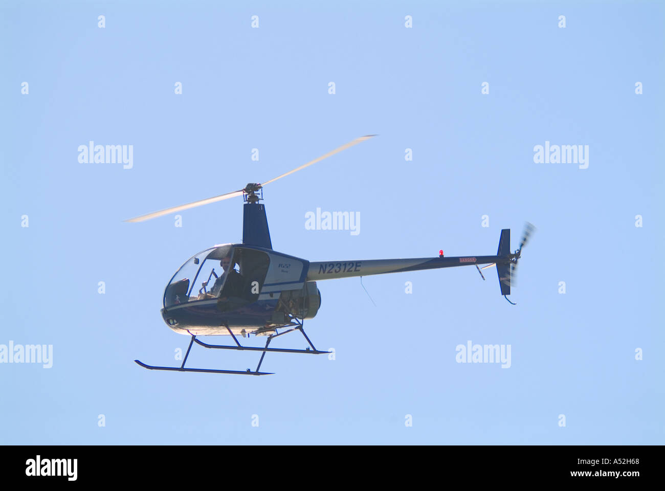 R22 helicopter R22 chopper aircraft flying flight Stock Photo - Alamy