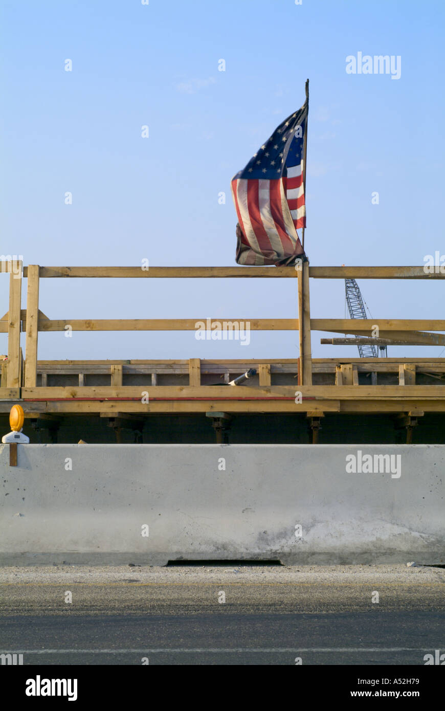 dirty U S flag at bridge construction site flags United States America ...