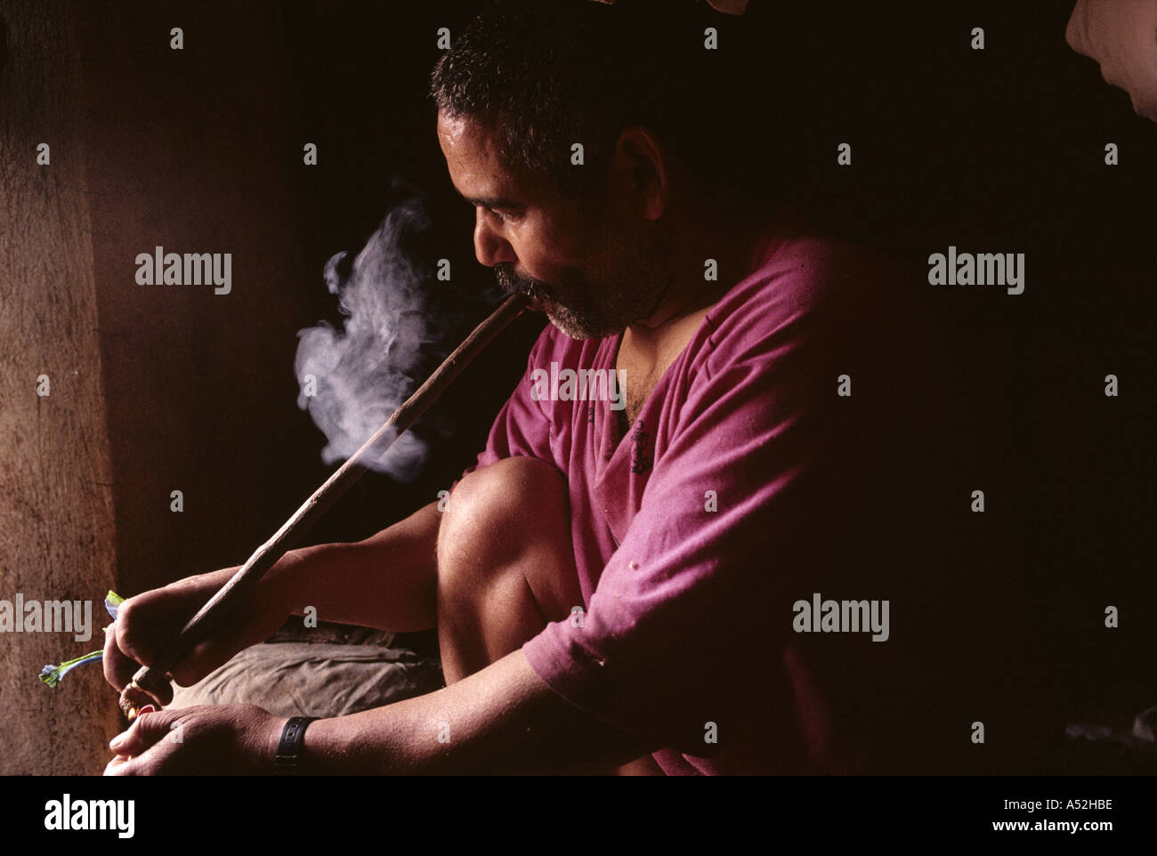 Africa Morocco Mohammed Nejeha smokes pipe of kif marijuana during ...