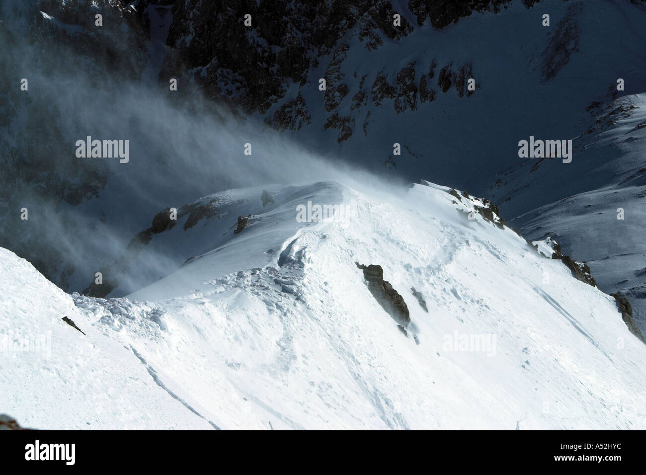 Wind blowing snow off mountain hi-res stock photography and images - Alamy