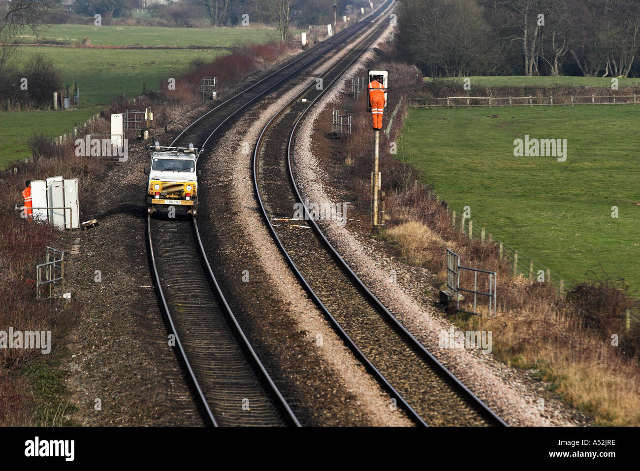 Men repairing railway signals in the UK Stock Photo - Alamy