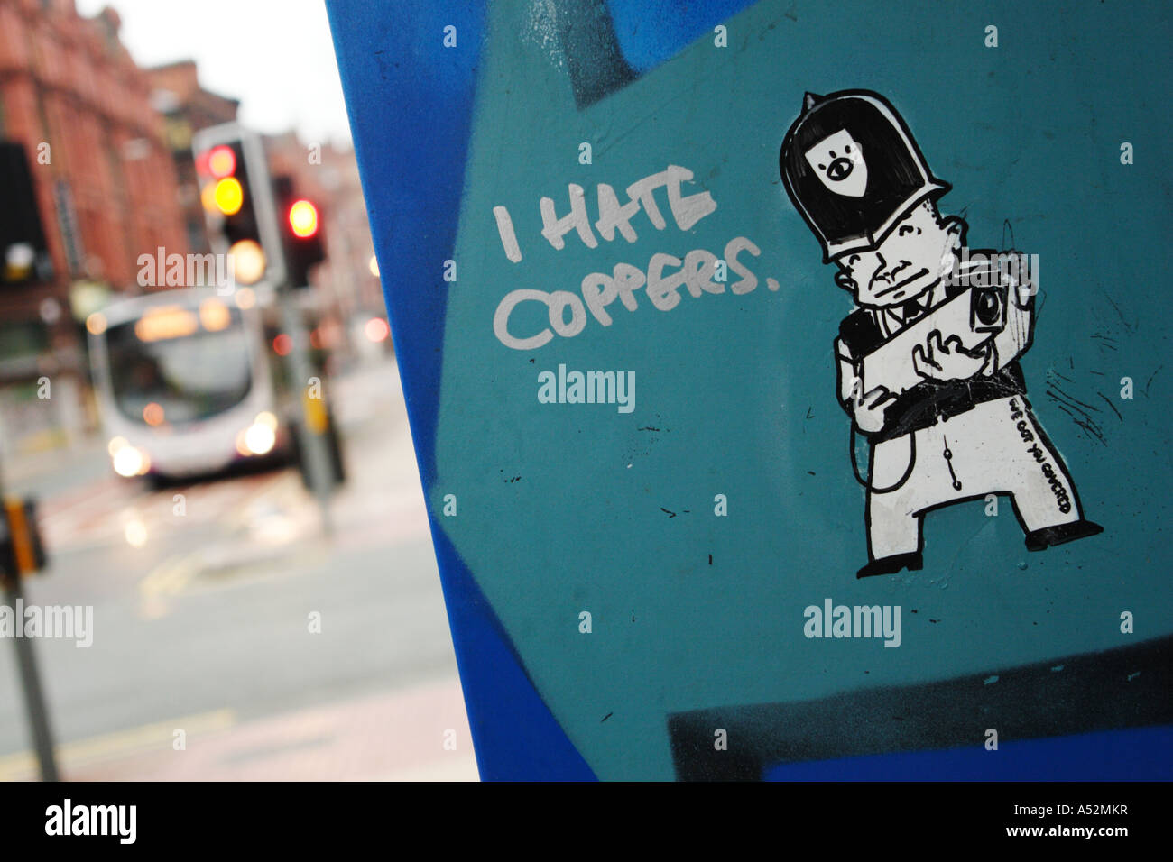 Cop Hting Grafitti Stock Photo - Alamy