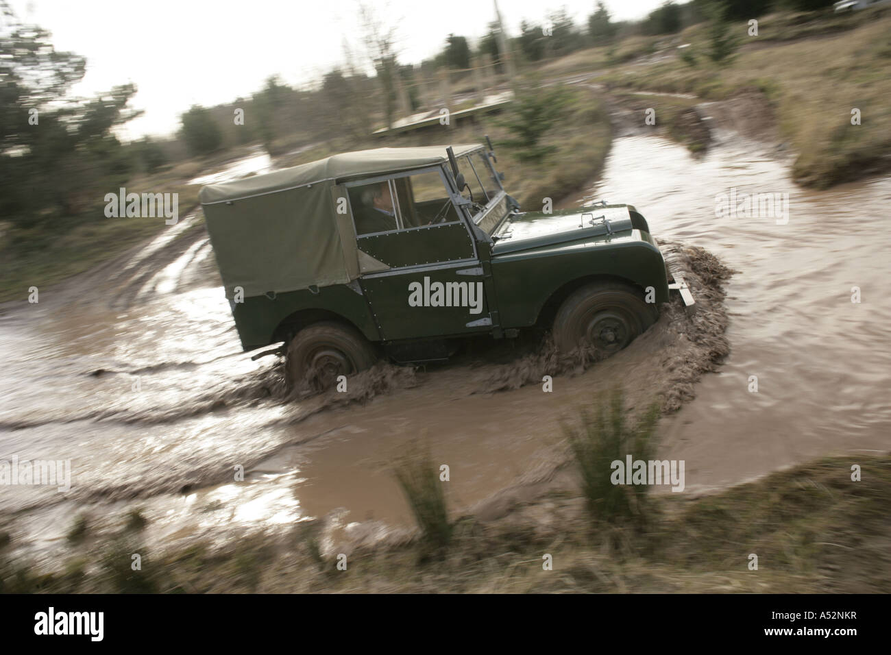 Series One Land Rover on an off-road course at the Land Rover factory ...