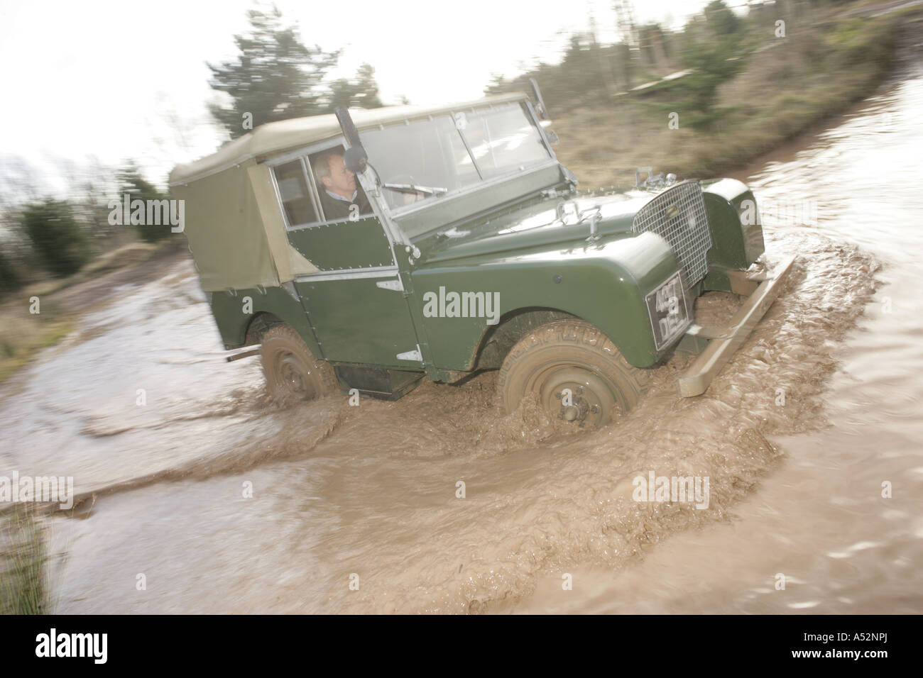 Series One Land Rover on an off-road course at the Land Rover factory ...