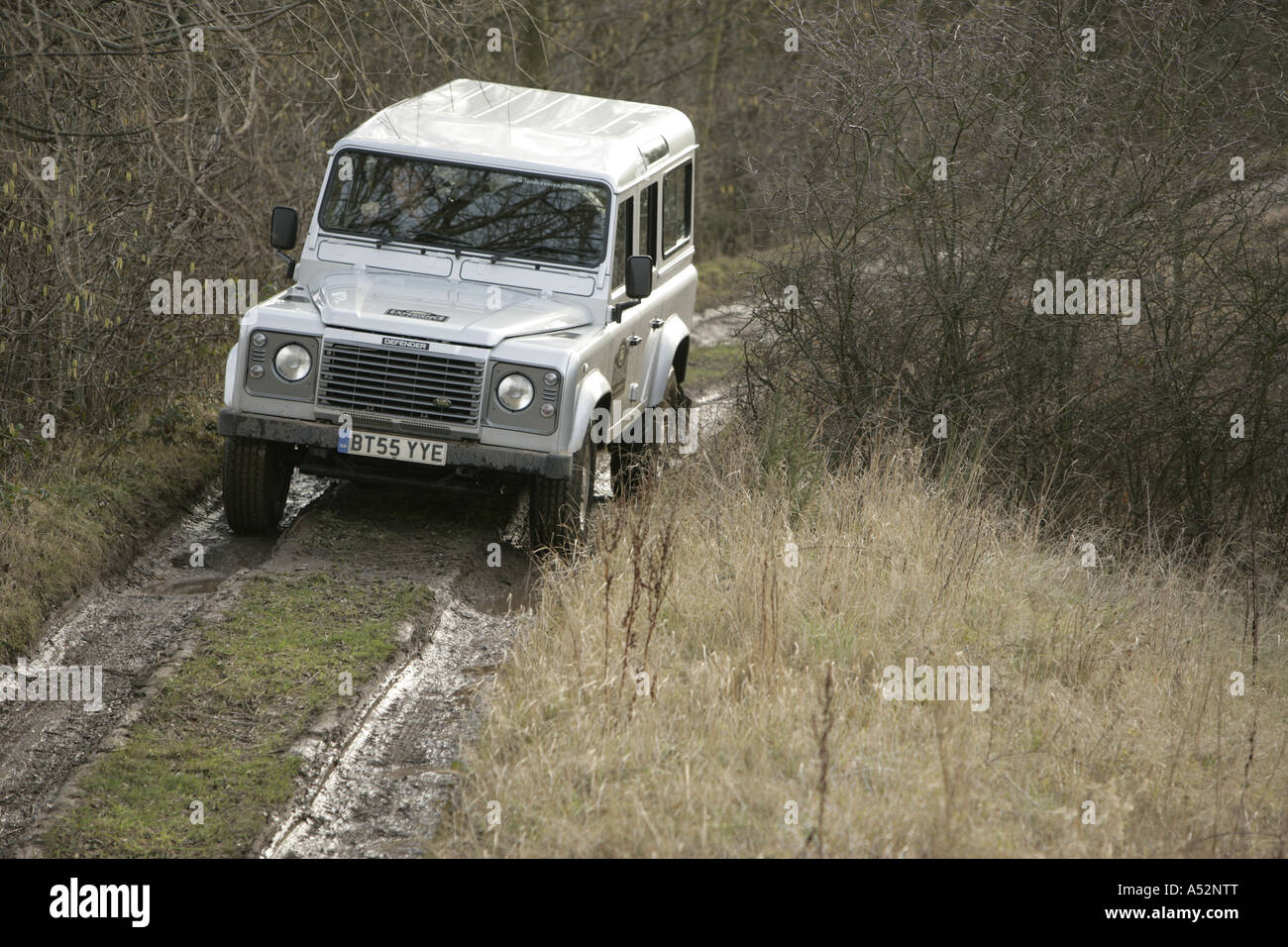 Land Rover Defender on an off-road course at the Land Rover factory in ...