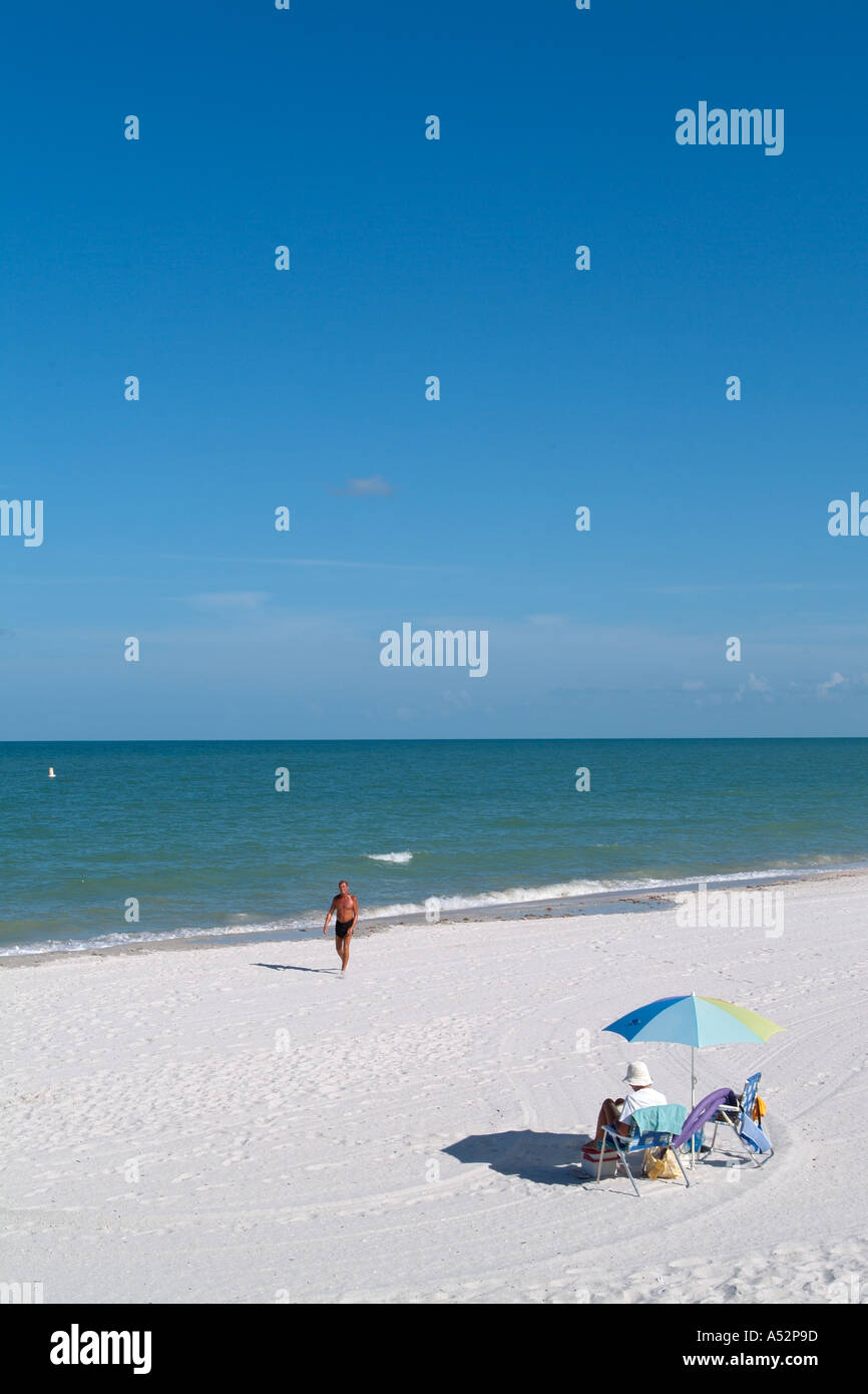 Naples Florida beach scene coastal shoreline beaches umbrella Stock ...