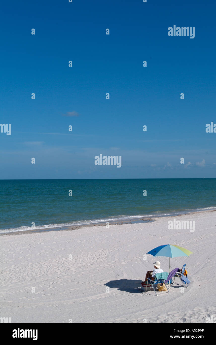 Naples Florida beach scene coastal shoreline beaches umbrella Stock ...