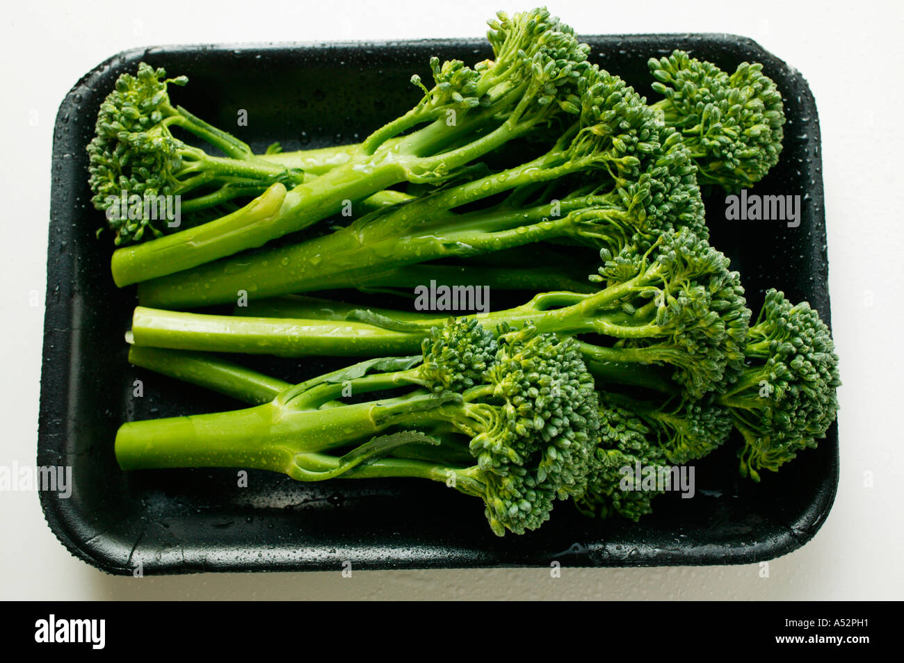 Broccoli in black plastic container Stock Photo - Alamy