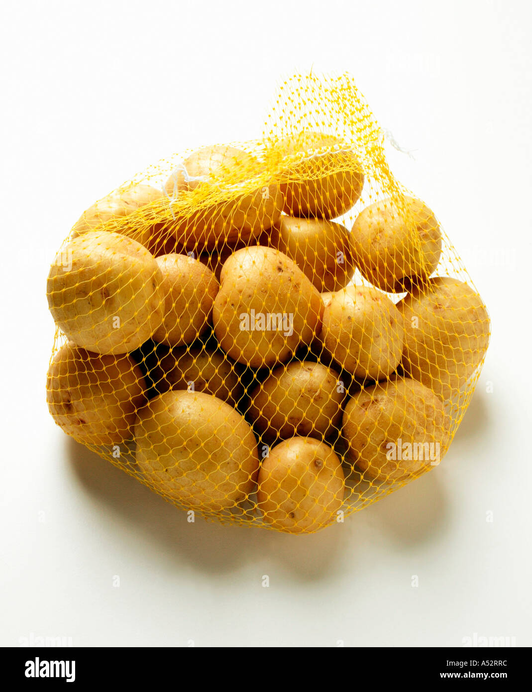 Yukon Gold potatoes in net Stock Photo - Alamy