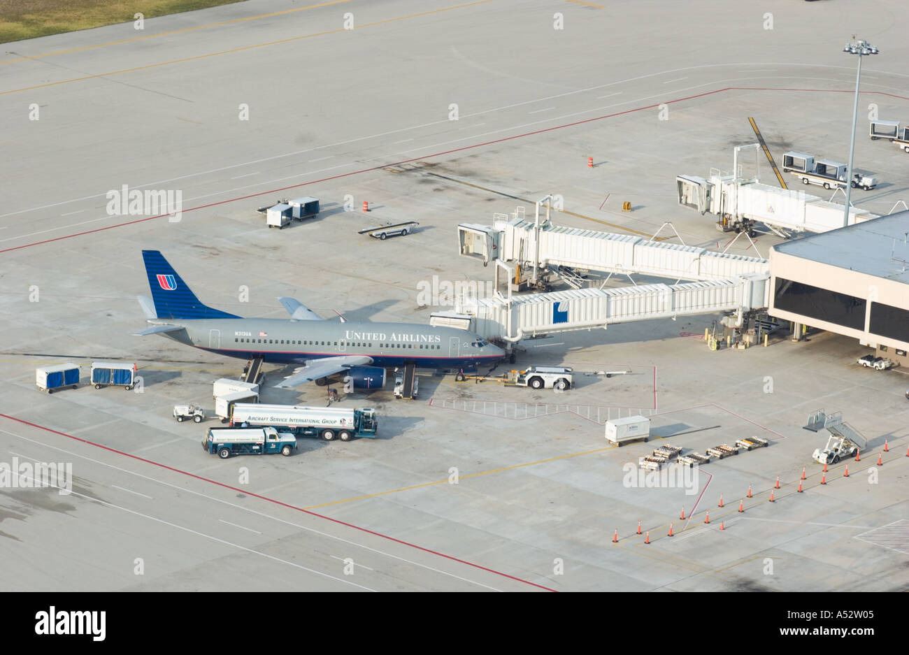 United Airlines jet at airport terminal aircraft airplane ...