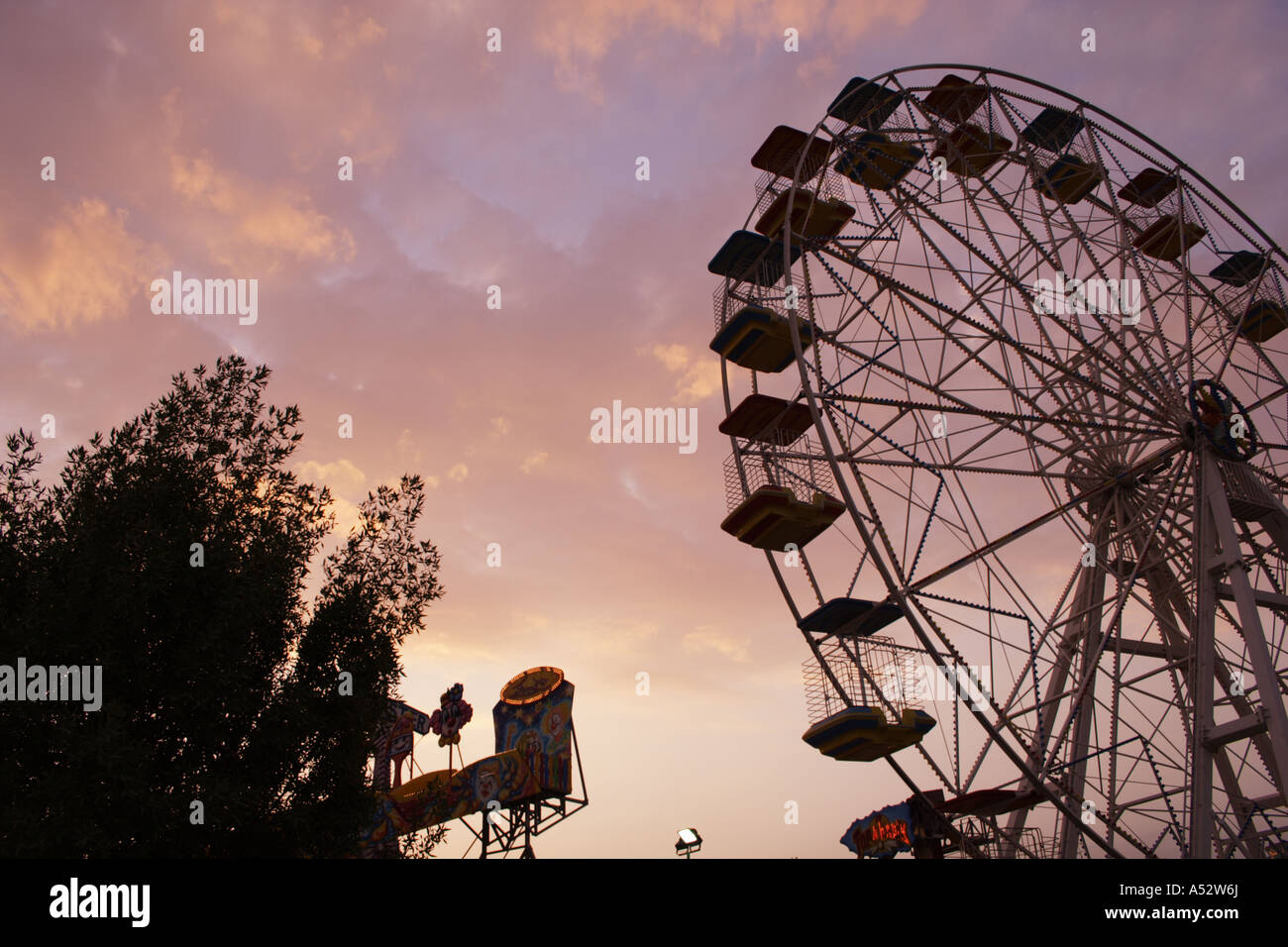 Carnival ferris wheel in Kuwait City Stock Photo - Alamy