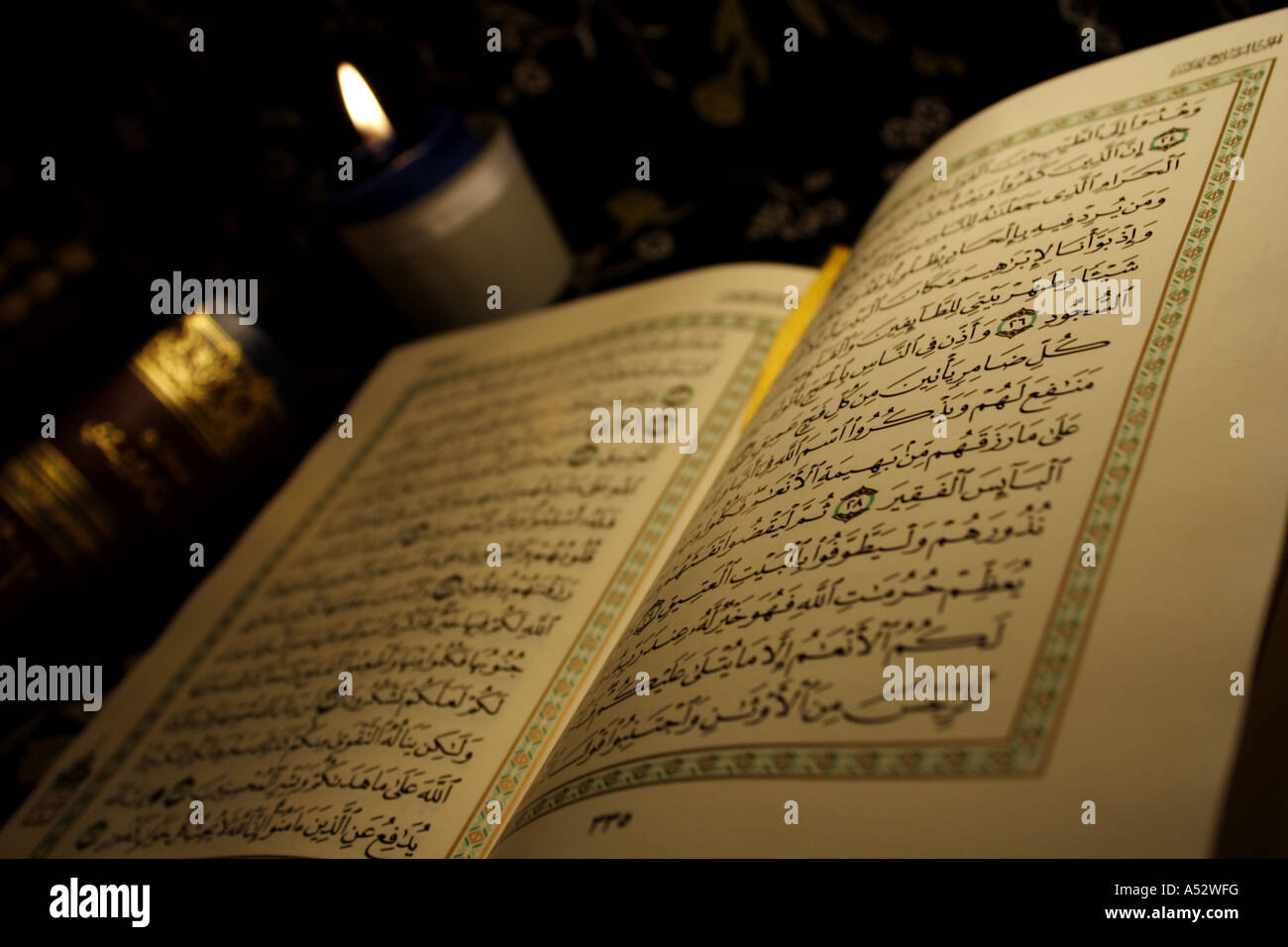 Open Holy Koran book Stock Photo - Alamy