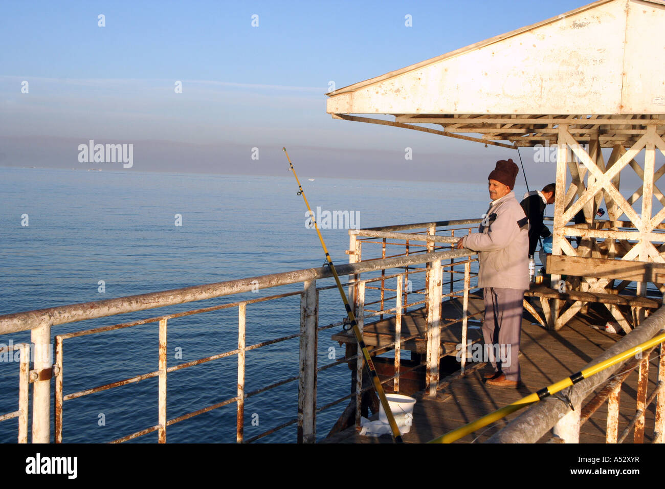 old man fishing in arabian gulf Stock Photo - Alamy