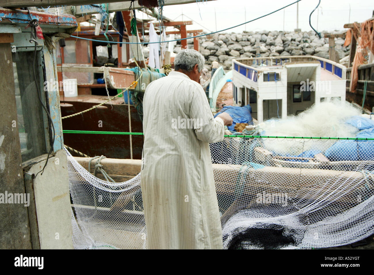 fishing nets maker Stock Photo - Alamy