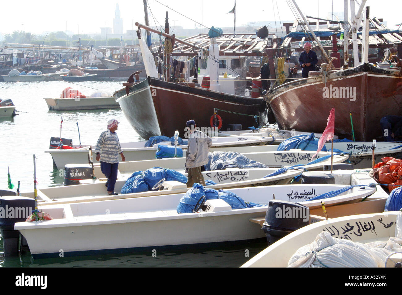 fishers & fishing ships in kuwaiti harbor Stock Photo - Alamy