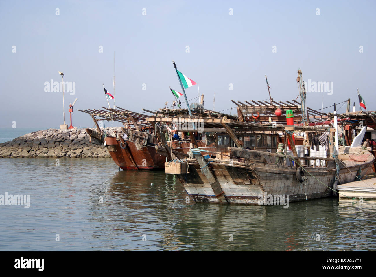 traditional fishing ships in kuwaiti harbor Stock Photo - Alamy