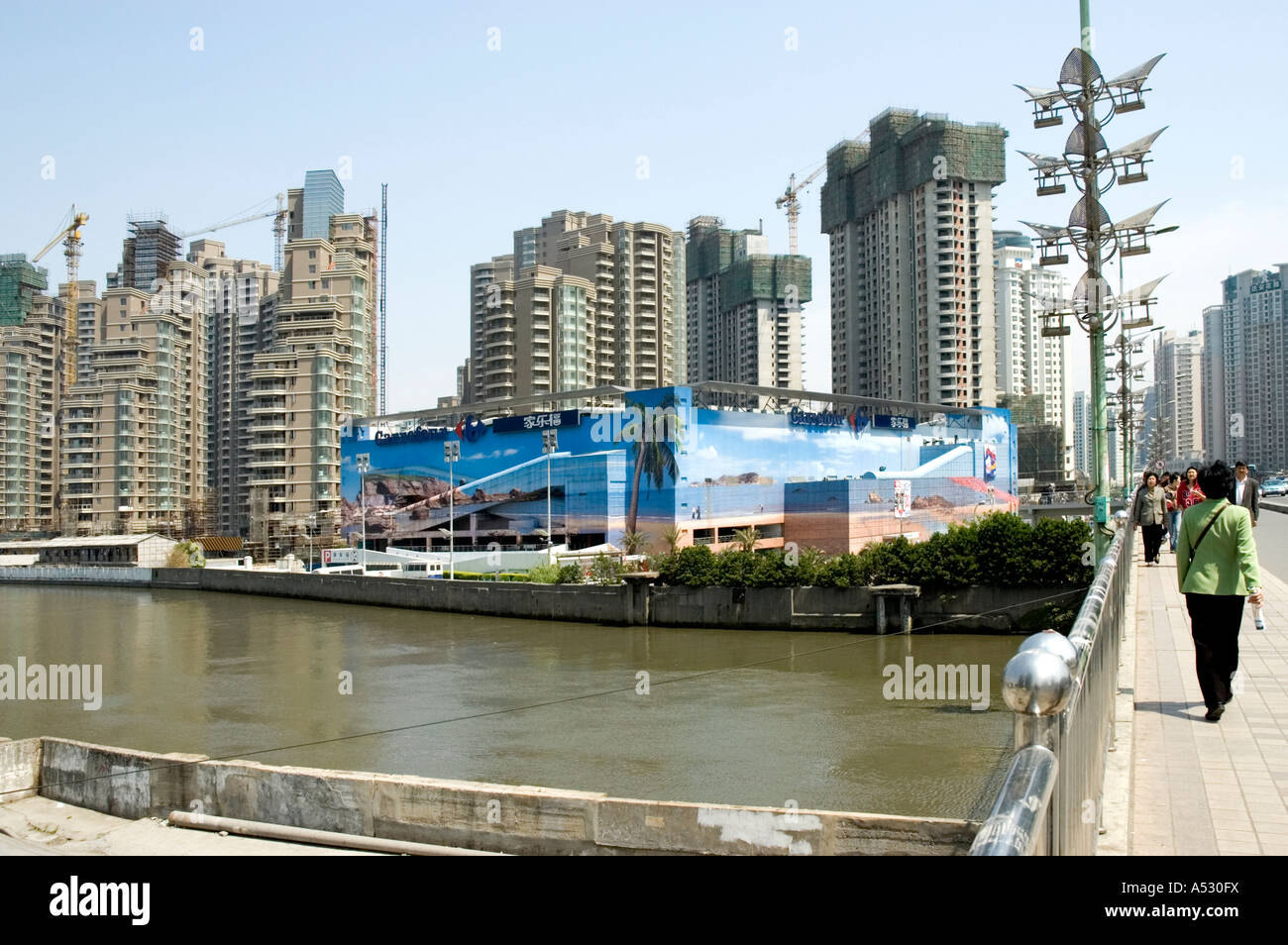 Carrefour's Supermarket in front of the high rise buildings of Shanghai ...