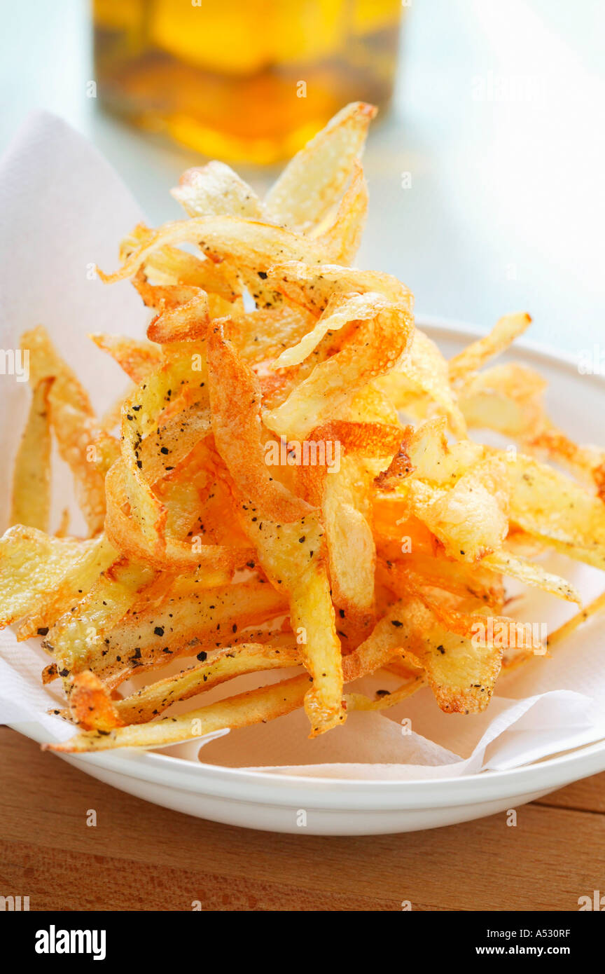 Home made potato crisps Stock Photo - Alamy
