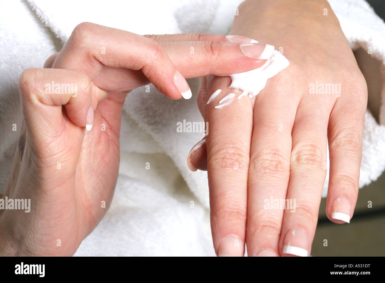 Young Woman Applying Hand Cream Model Released Stock Photo - Alamy