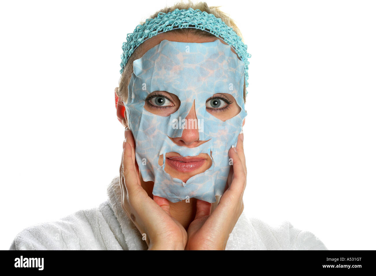 Young Woman Using Face Mask Model Released Stock Photo - Alamy