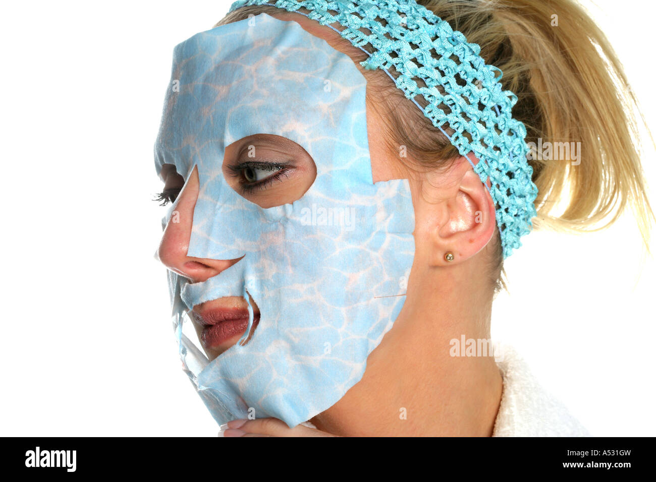 Young Woman Using Face Mask Model Released Stock Photo - Alamy