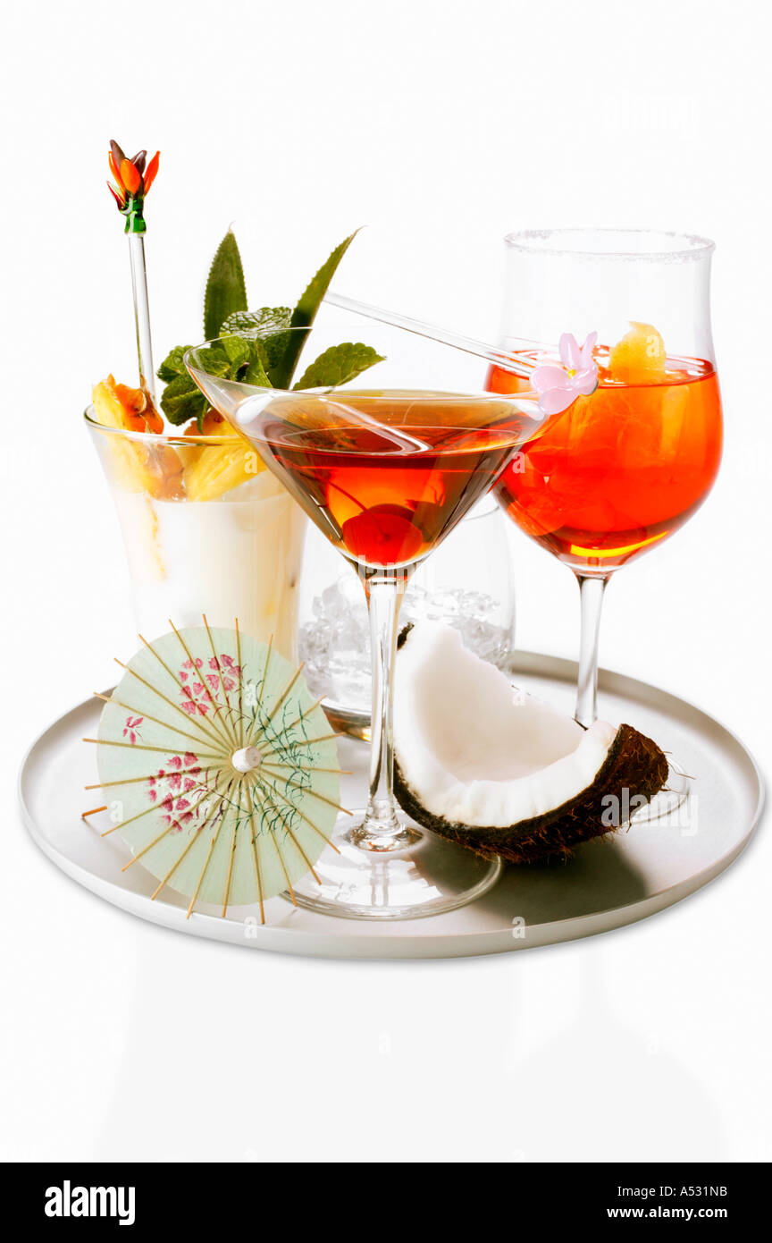 Three cocktails on a tray Stock Photo - Alamy